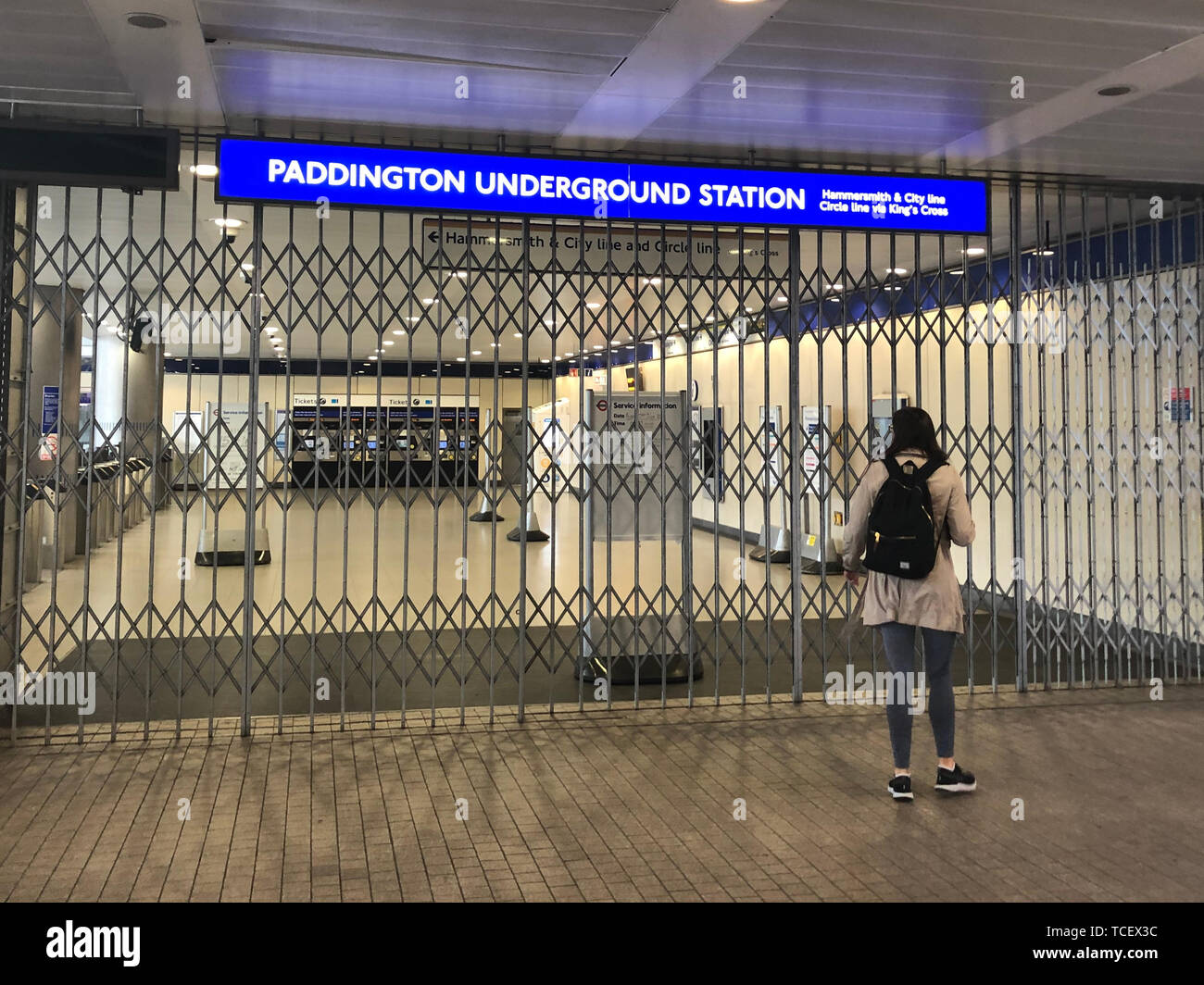 Closed gates at London's Paddington Underground Station as commuters ...