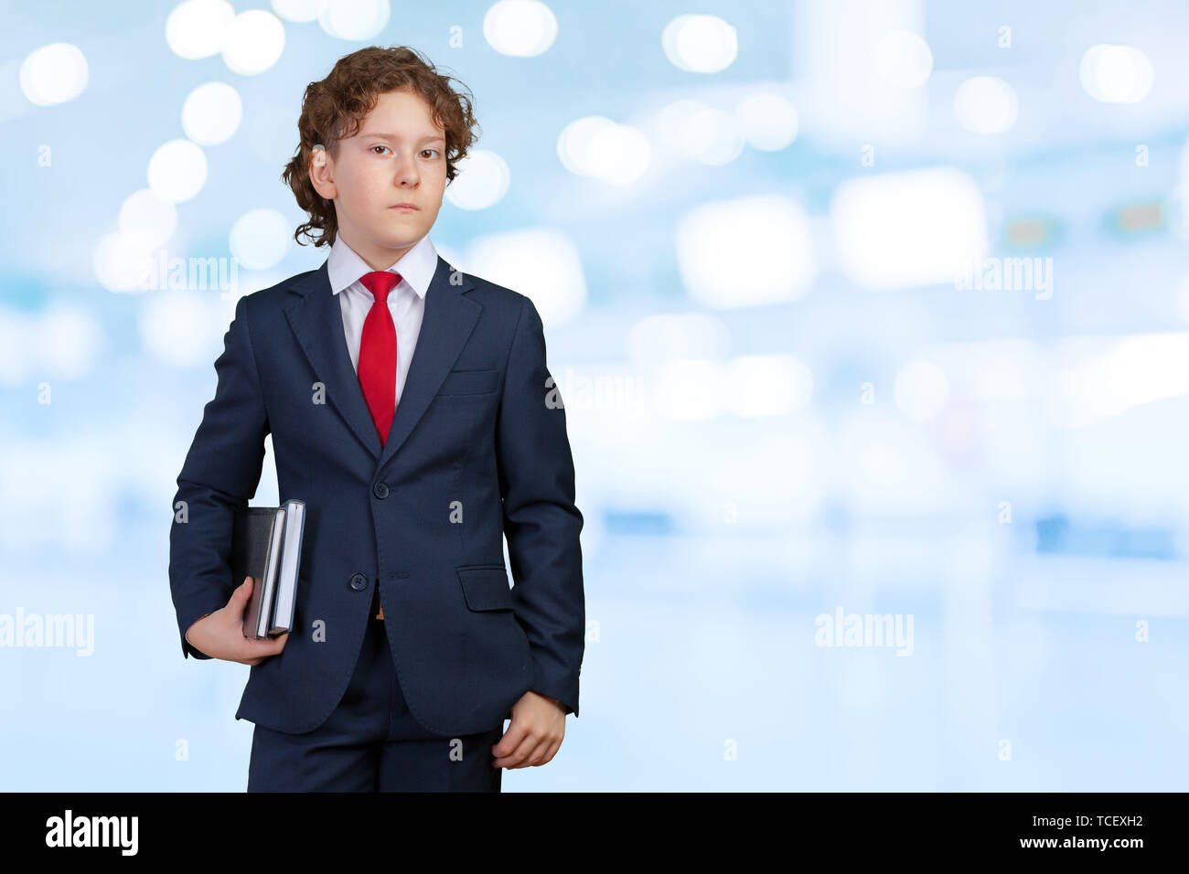 Portrait of a kid businessman Stock Photo - Alamy