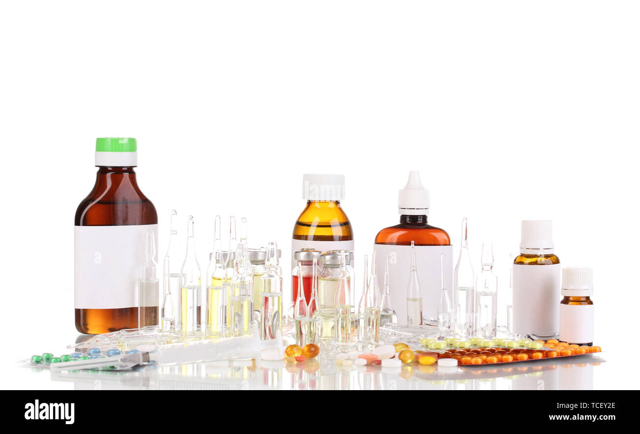 Medical bottles with syringe, medical ampoules and tablets isolated on ...