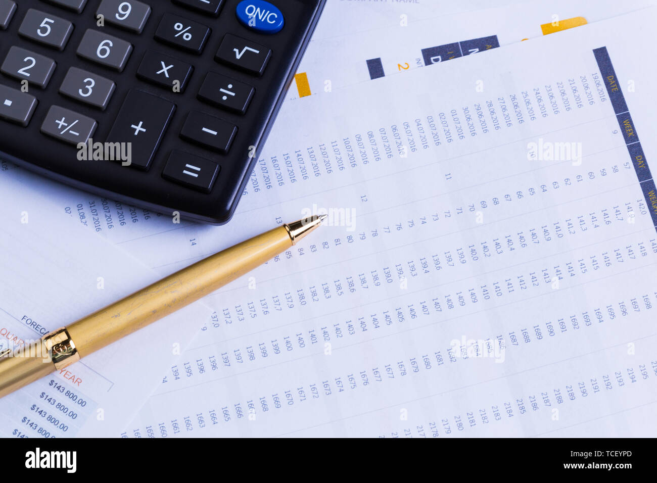 Graphs and Calculator Stock Photo - Alamy