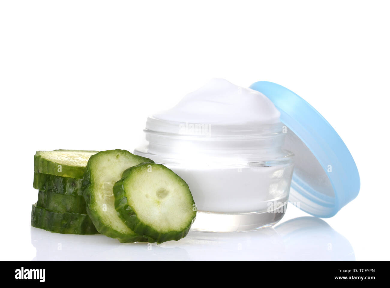cream and fresh sliced cucumber isolated on white Stock Photo - Alamy