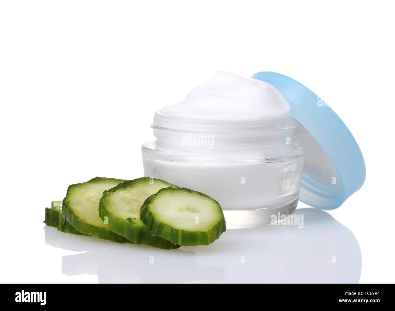 cream and fresh sliced cucumber isolated on white Stock Photo - Alamy