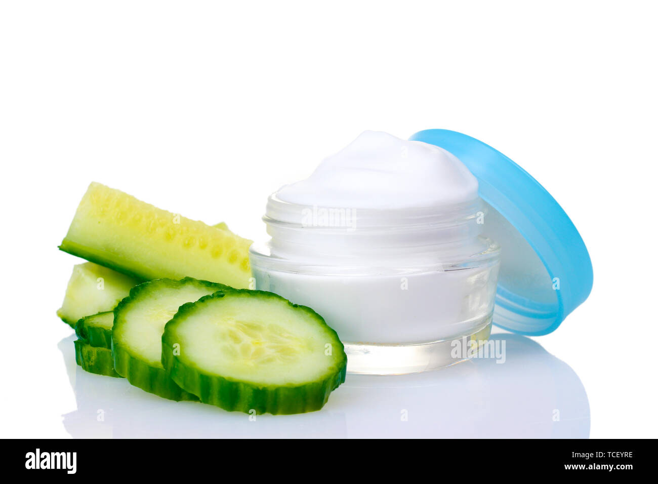 cream and fresh sliced cucumber isolated on white Stock Photo - Alamy