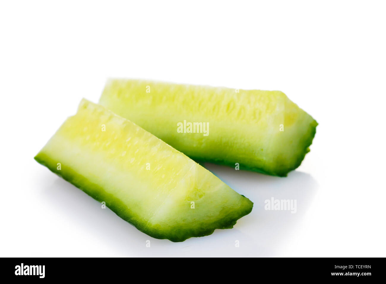 fresh sliced cucumber isolated on white Stock Photo - Alamy