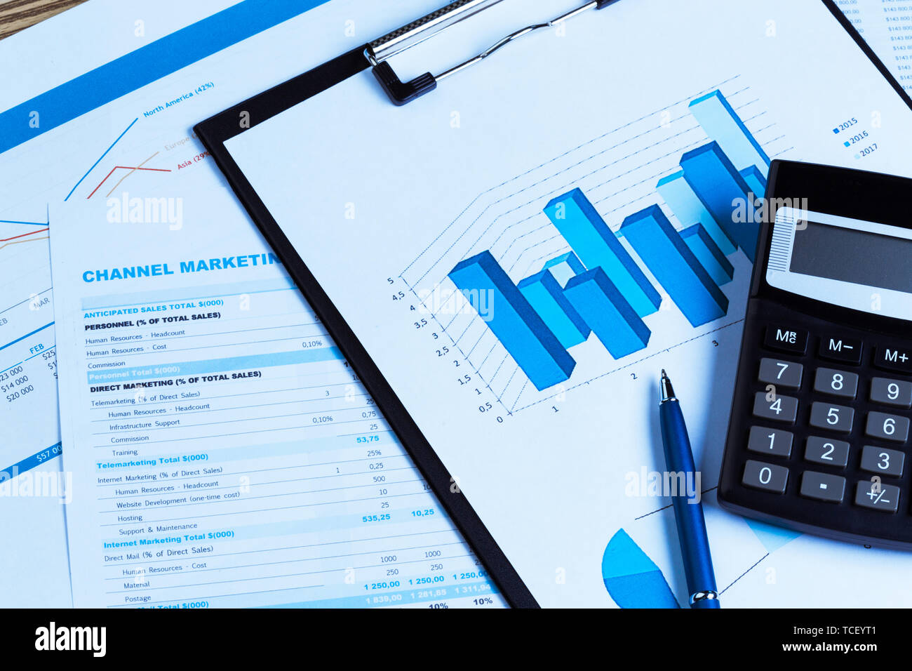Graphs and Calculator Stock Photo - Alamy