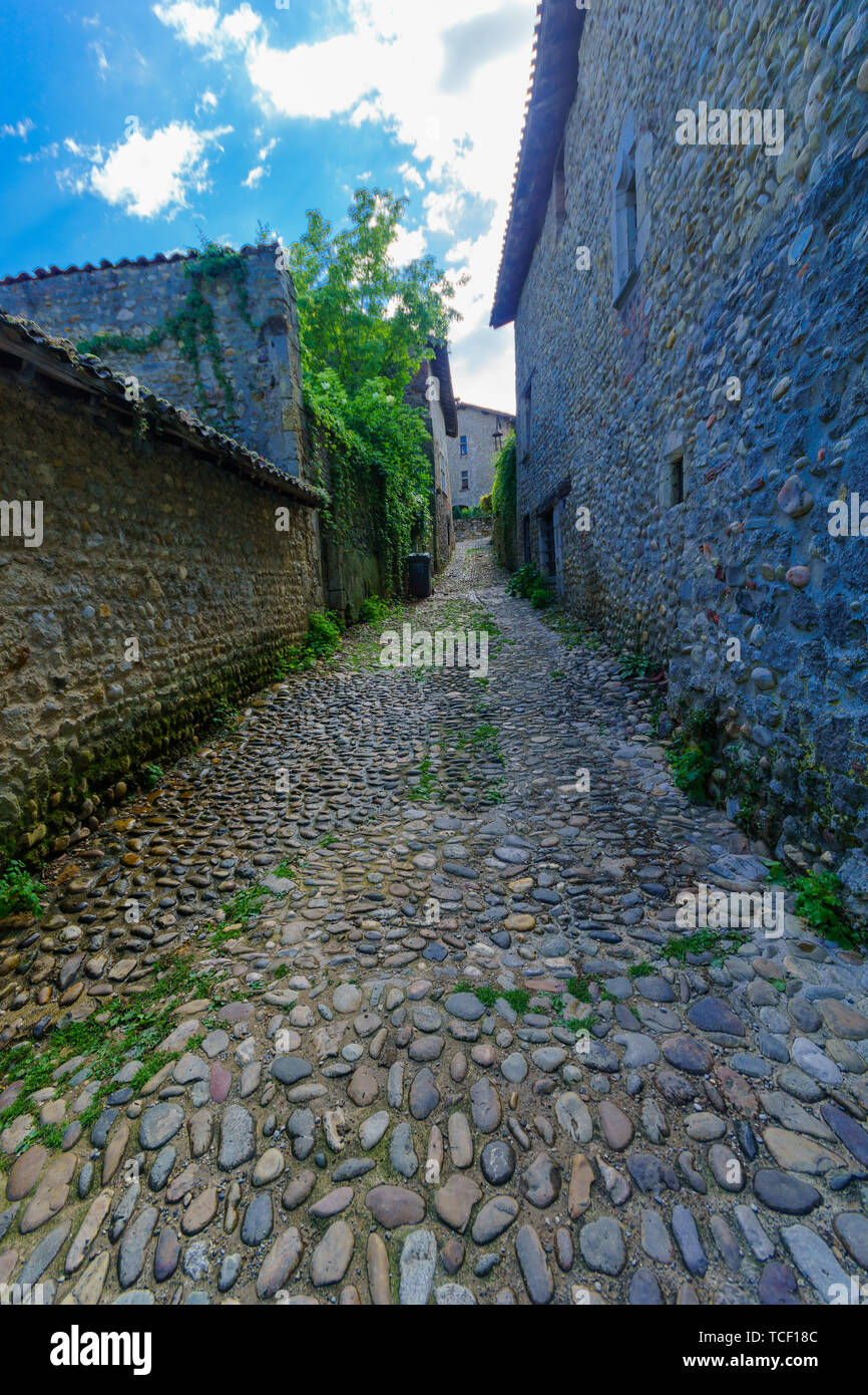 View of an alley in the medieval village Perouges, Ain department ...