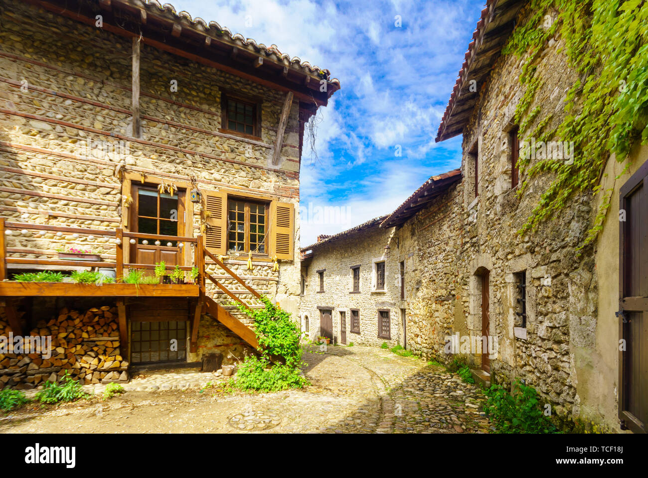 View of an alley in the medieval village Perouges, Ain department ...