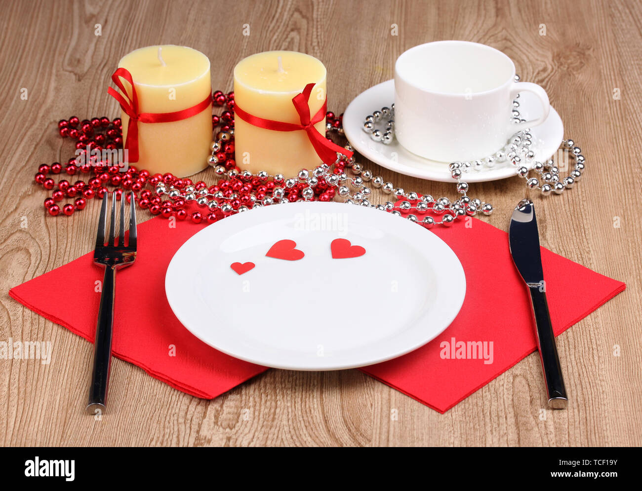 Table setting on wooden background Stock Photo - Alamy