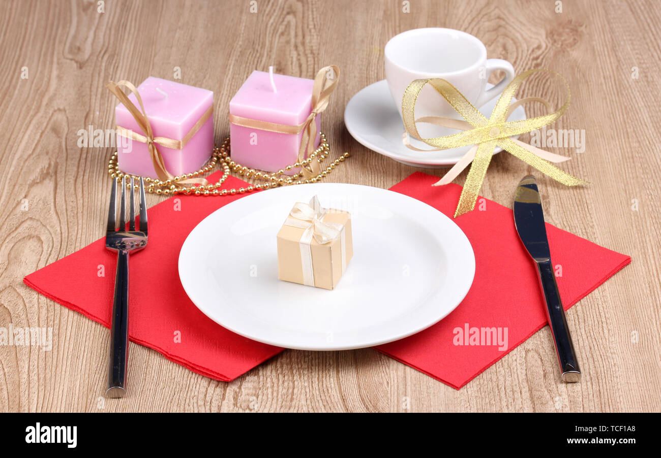 Table setting on wooden background Stock Photo - Alamy