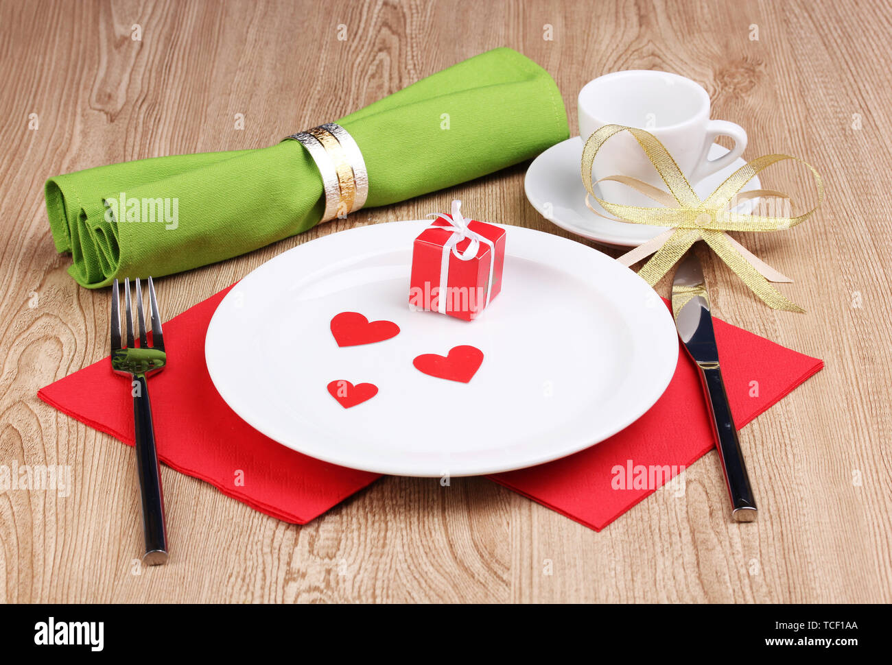 Table setting on wooden background Stock Photo - Alamy