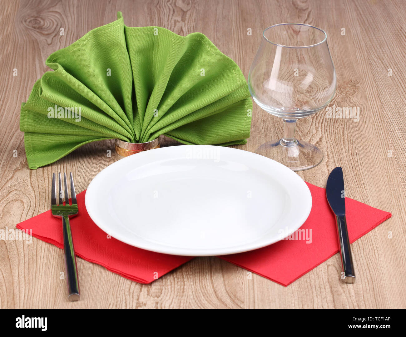 Table setting on wooden background Stock Photo - Alamy