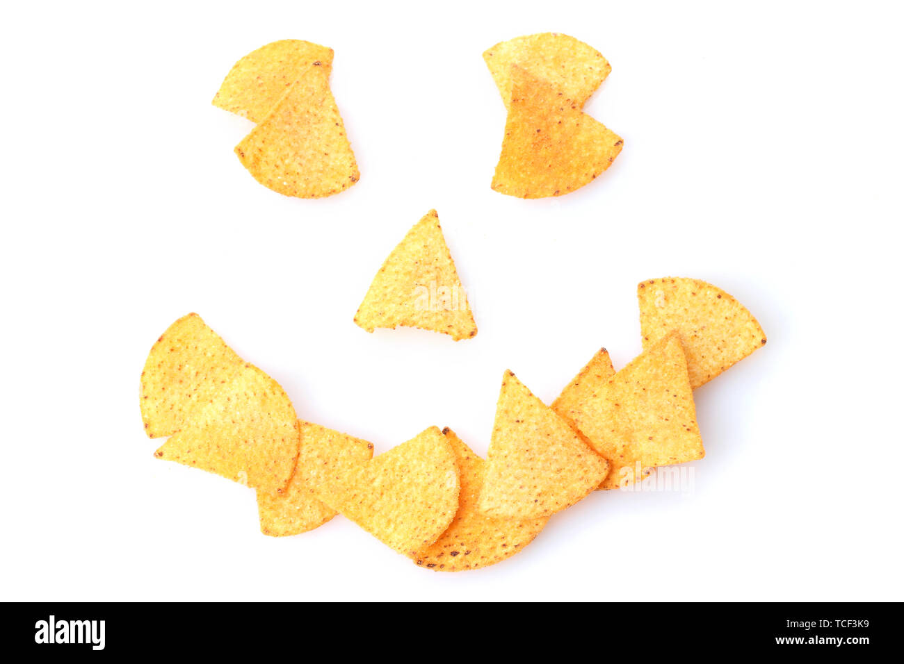 Delicious potato chips smile shape isolated on white Stock Photo - Alamy