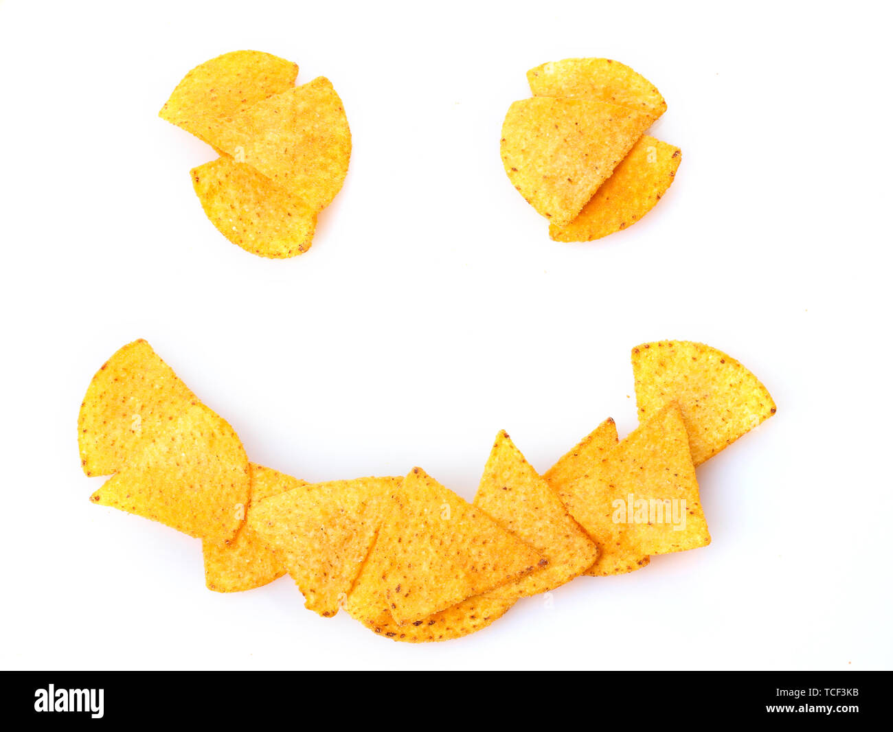 Delicious potato chips smile shape isolated on white Stock Photo - Alamy