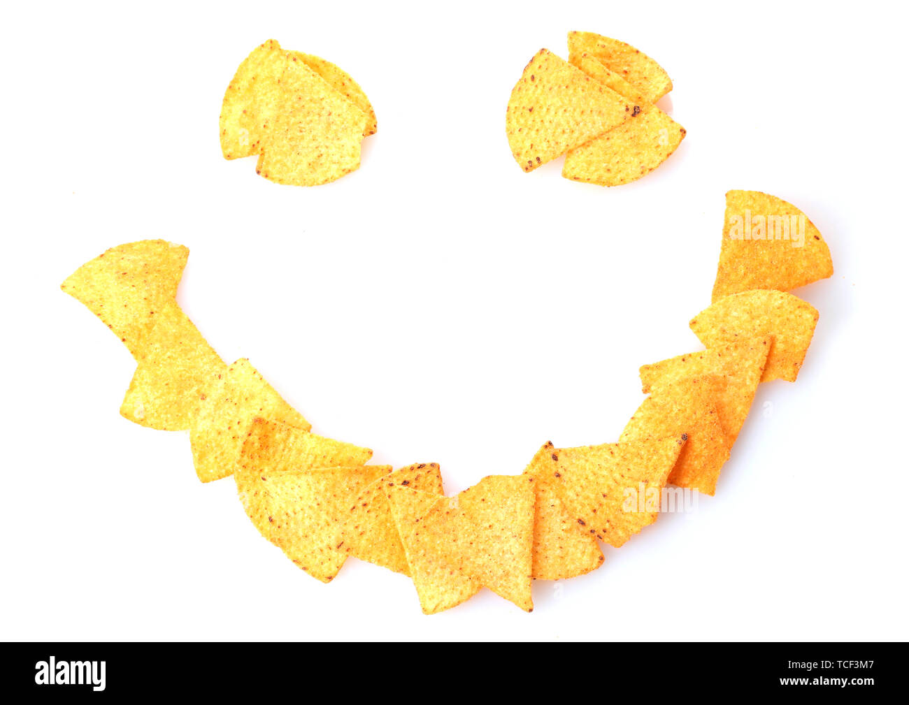 Delicious potato chips smile shape isolated on white Stock Photo - Alamy