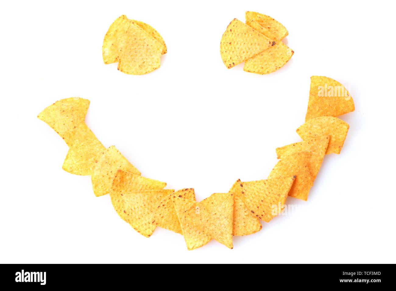 Delicious potato chips smile shape isolated on white Stock Photo - Alamy