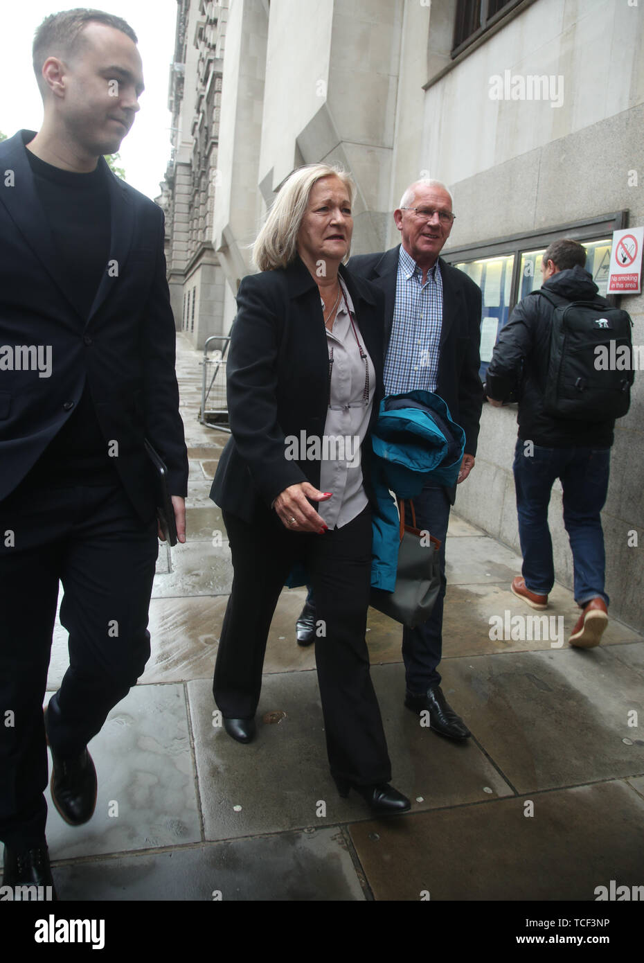 Sally Challen is flanked by her son David and brother Chris Jenney as ...