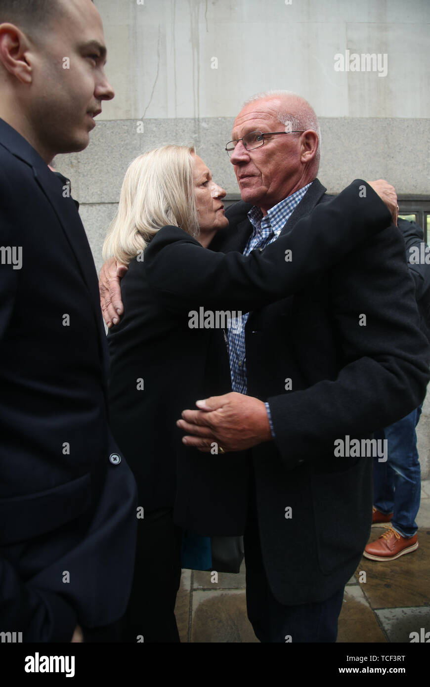 Sally Challen is hugged by her brother Chris Jenney with son David as ...