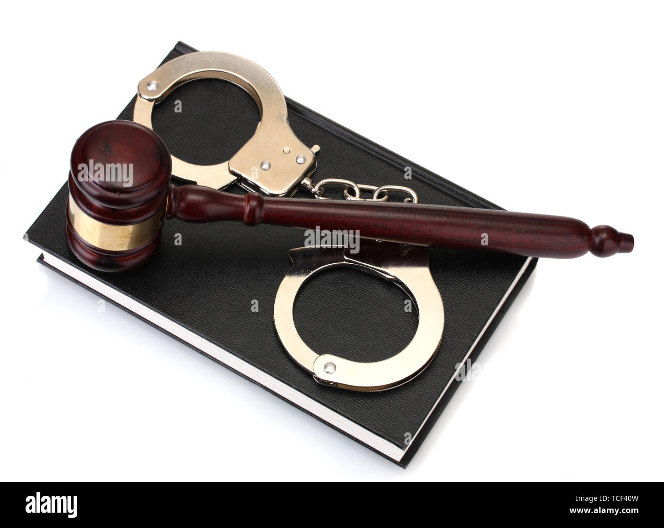 wooden gavel, handcuffs and book isolated on white Stock Photo - Alamy