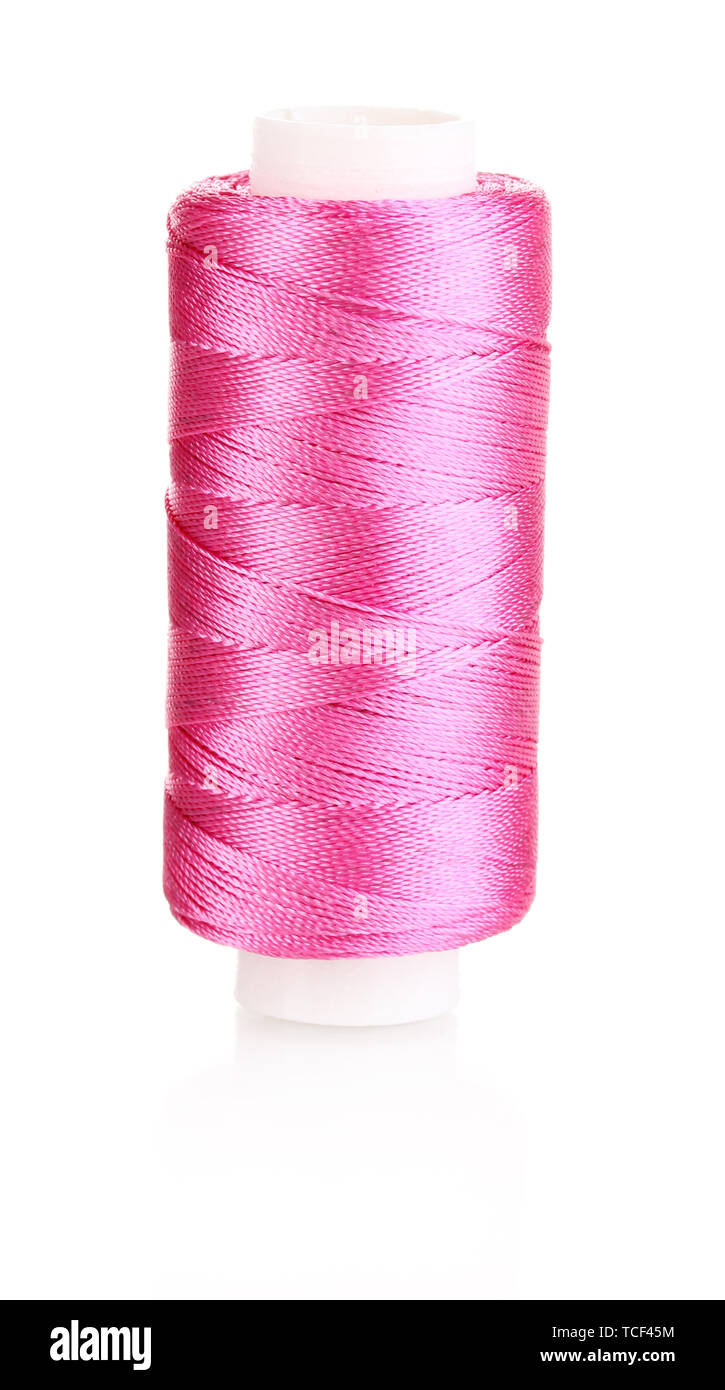 Pink bobbin thread isolated on white Stock Photo - Alamy