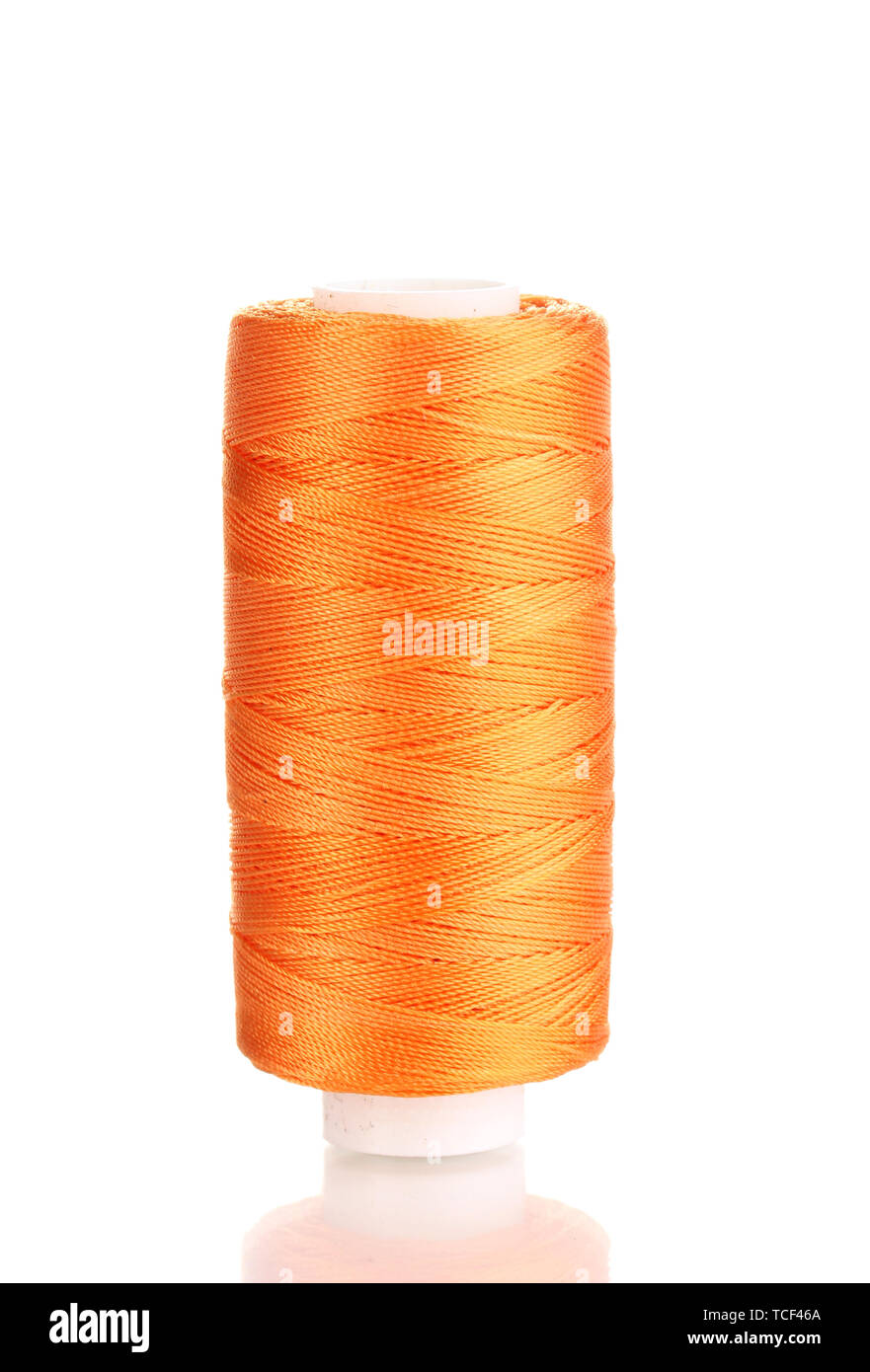 Orange bobbin thread isolated on white Stock Photo - Alamy