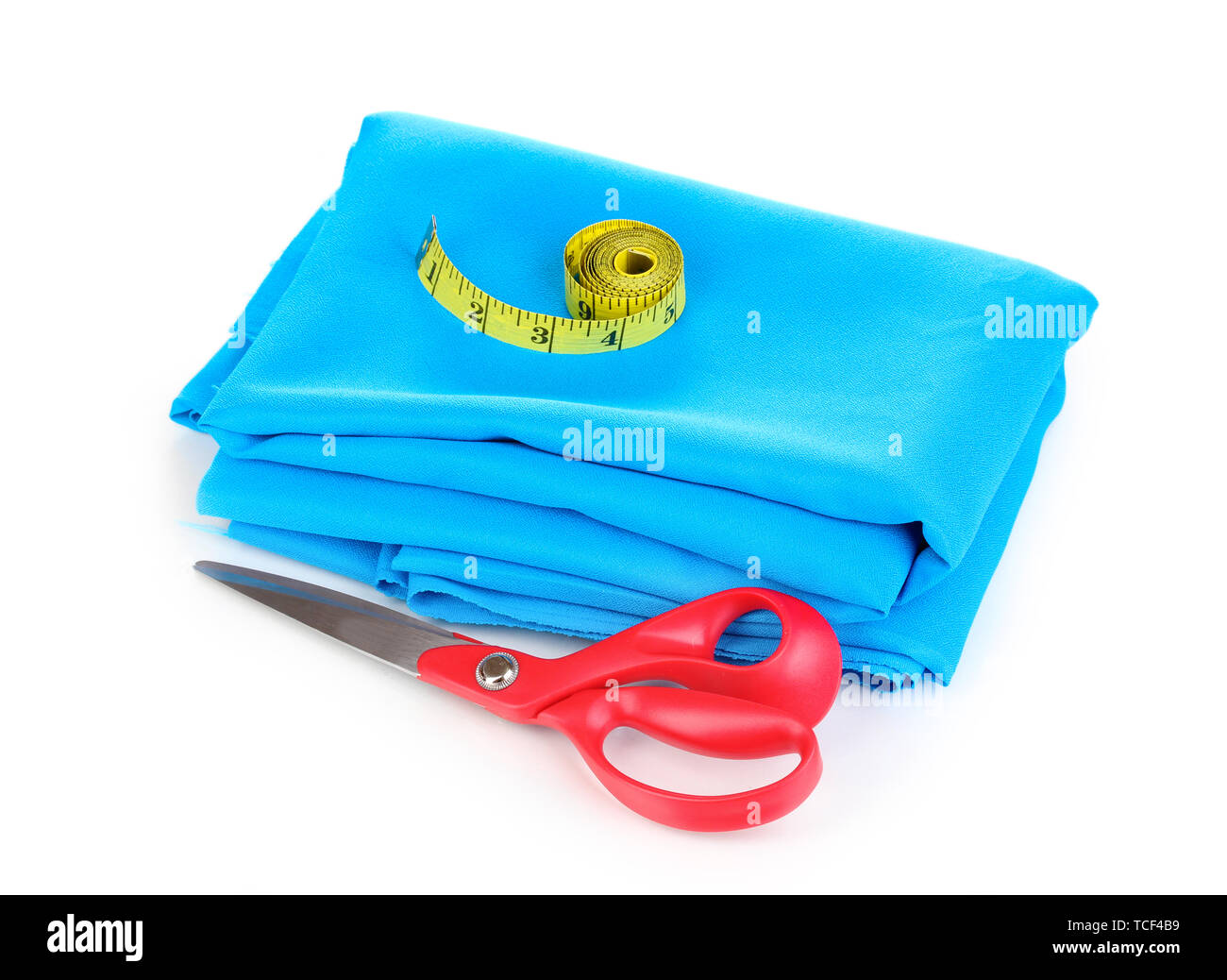 Scissors and measuring tape on fabric isolated on white Stock Photo - Alamy