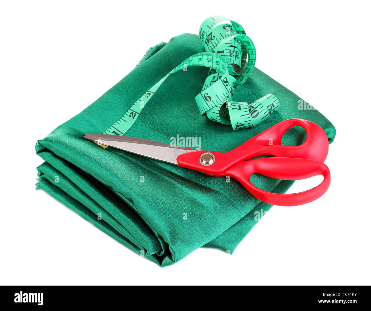 Scissors and measuring tape on fabric isolated on white Stock Photo - Alamy