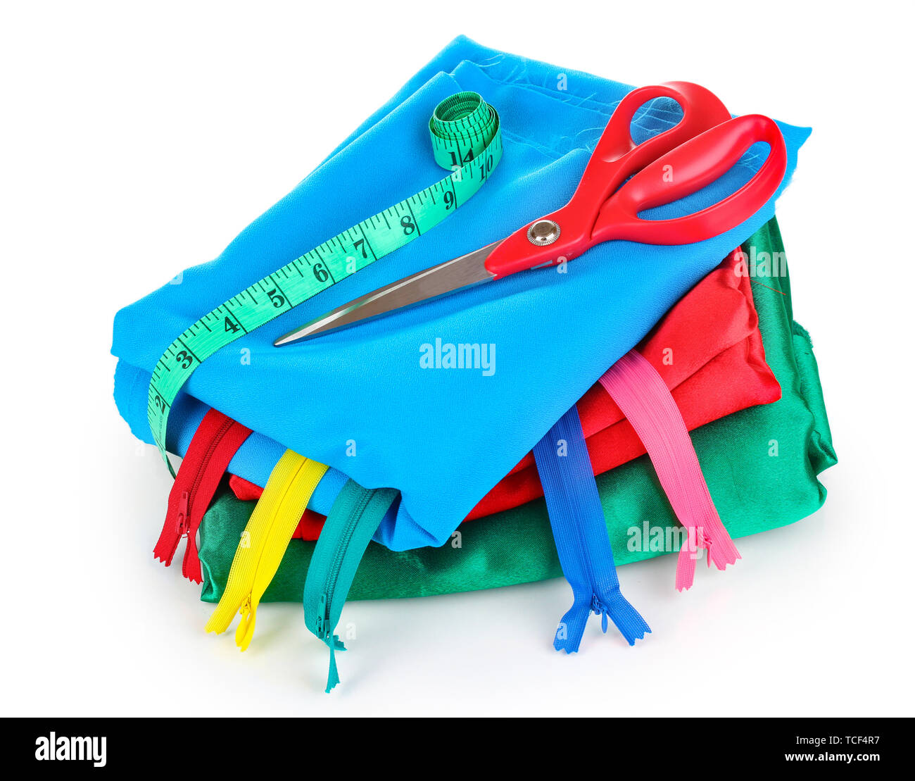 Scissors and measuring tape on fabric isolated on white Stock Photo - Alamy