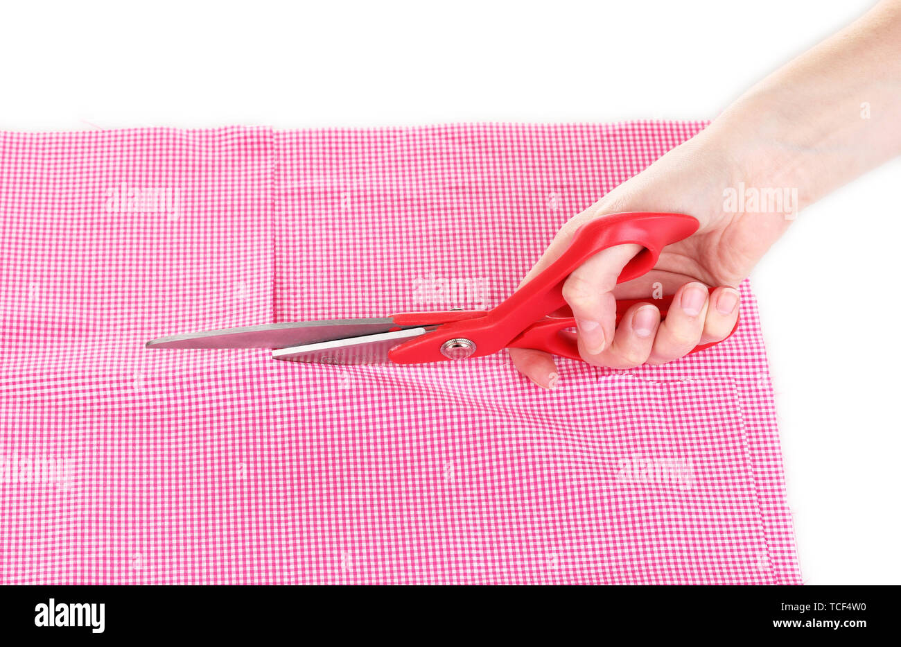 Woman cutting fabric Stock Photo - Alamy