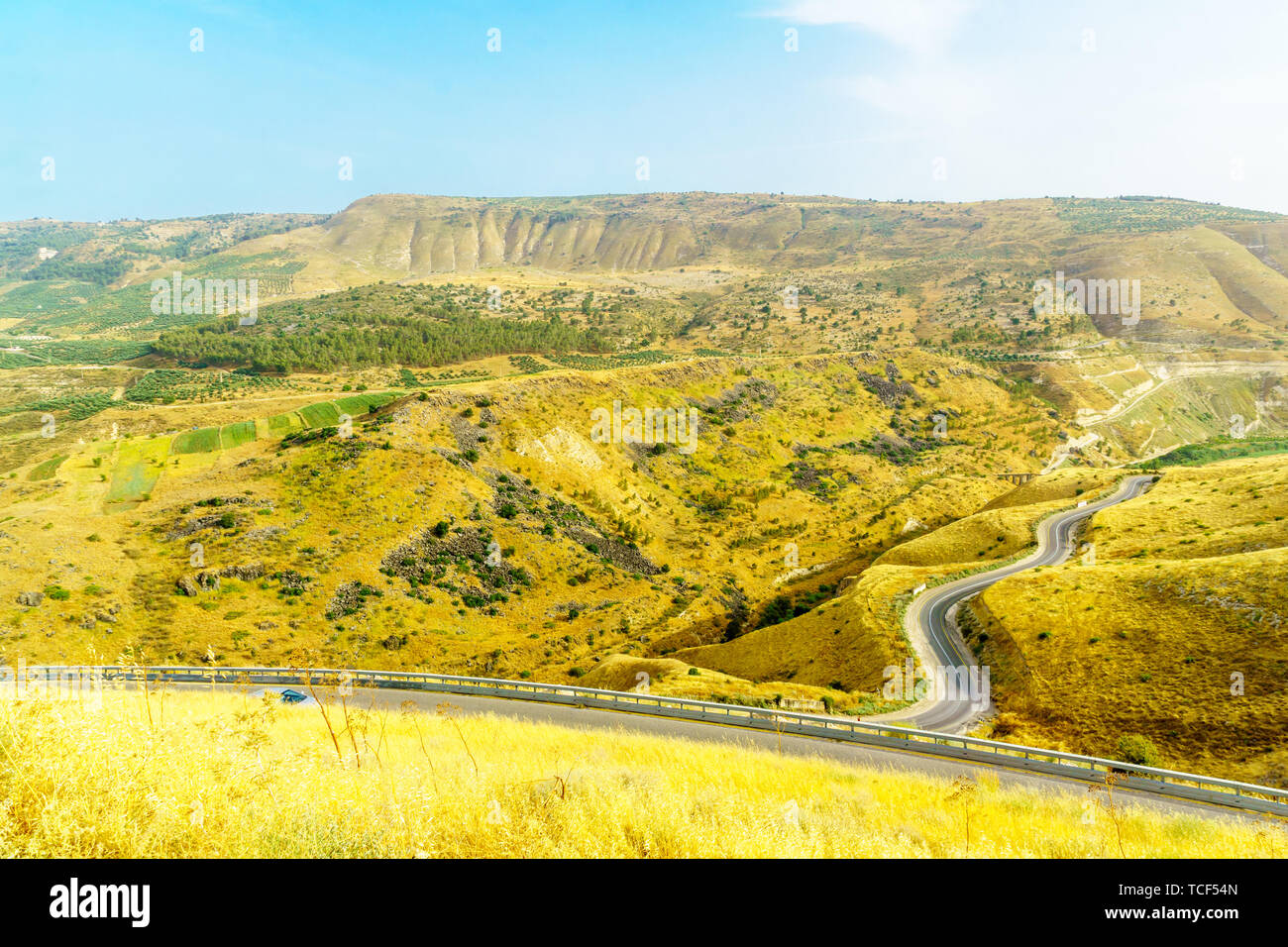 Landscape of the Golan Heights, winding road 98, and the Yarmouk River ...