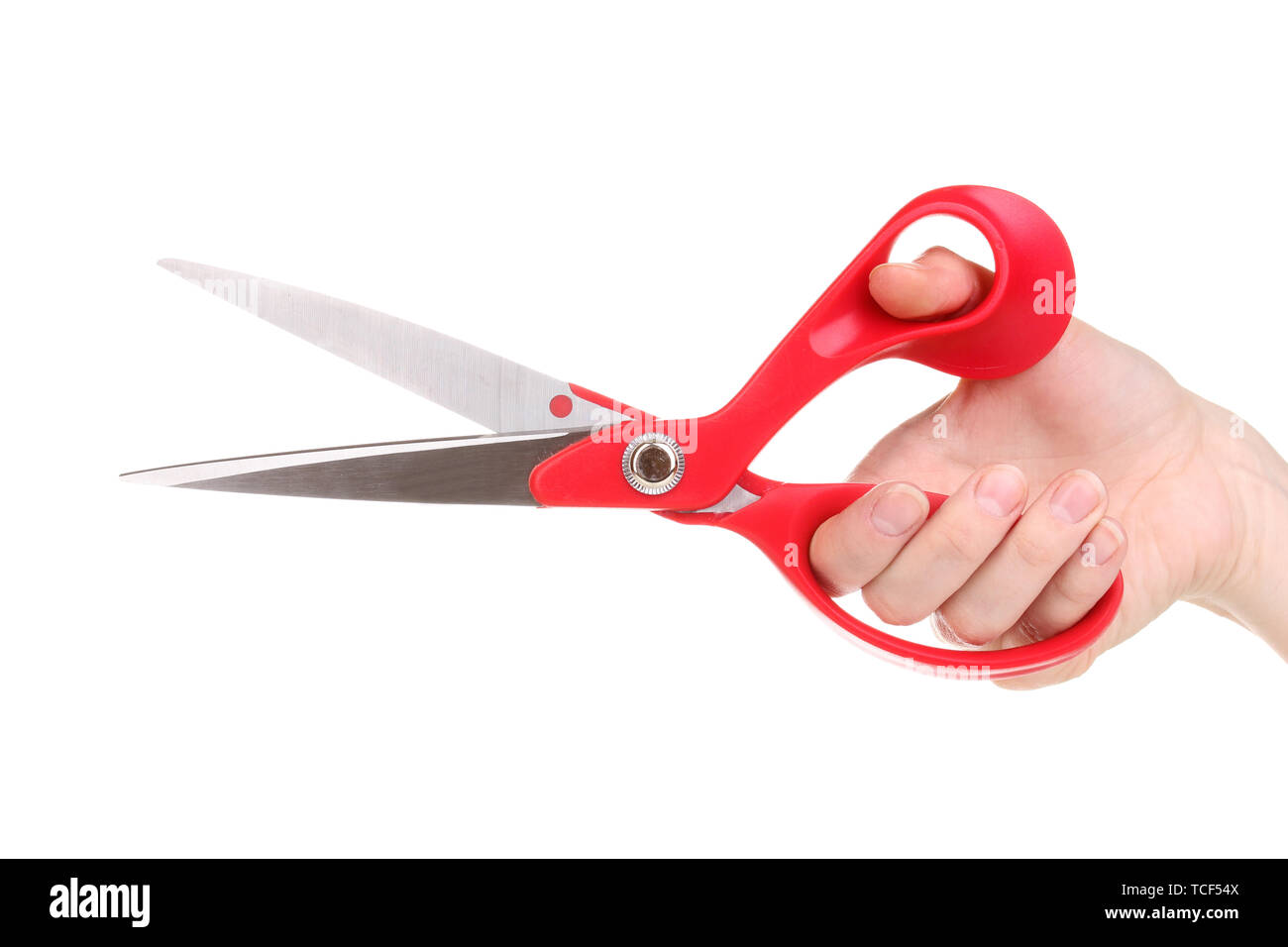 Sewing scissors in hand isolated on white Stock Photo - Alamy