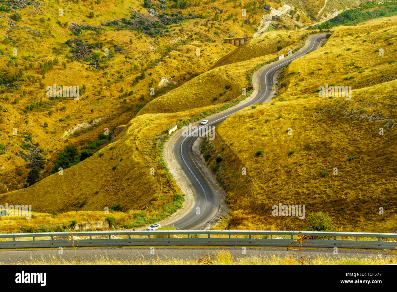 Landscape of the Golan Heights, winding road 98, and the Yarmouk River ...
