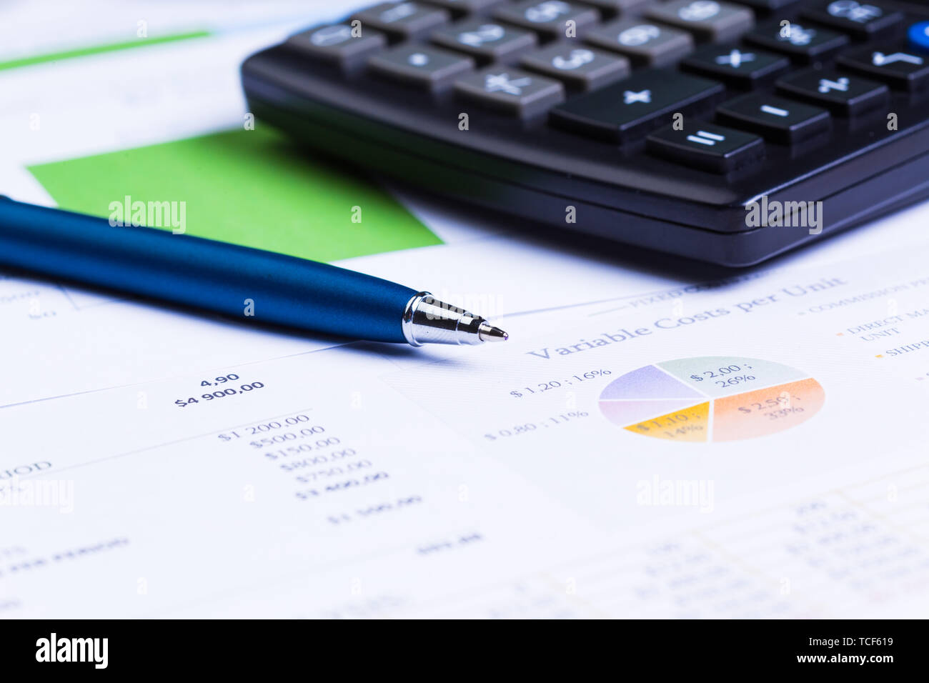 Graphs and Calculator Stock Photo - Alamy