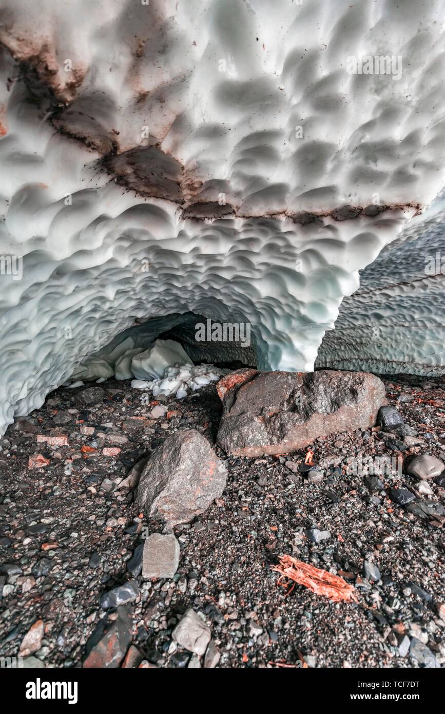 Entrance of an ice cave of a glacier, Big Four Ice Caves, Okanogan ...