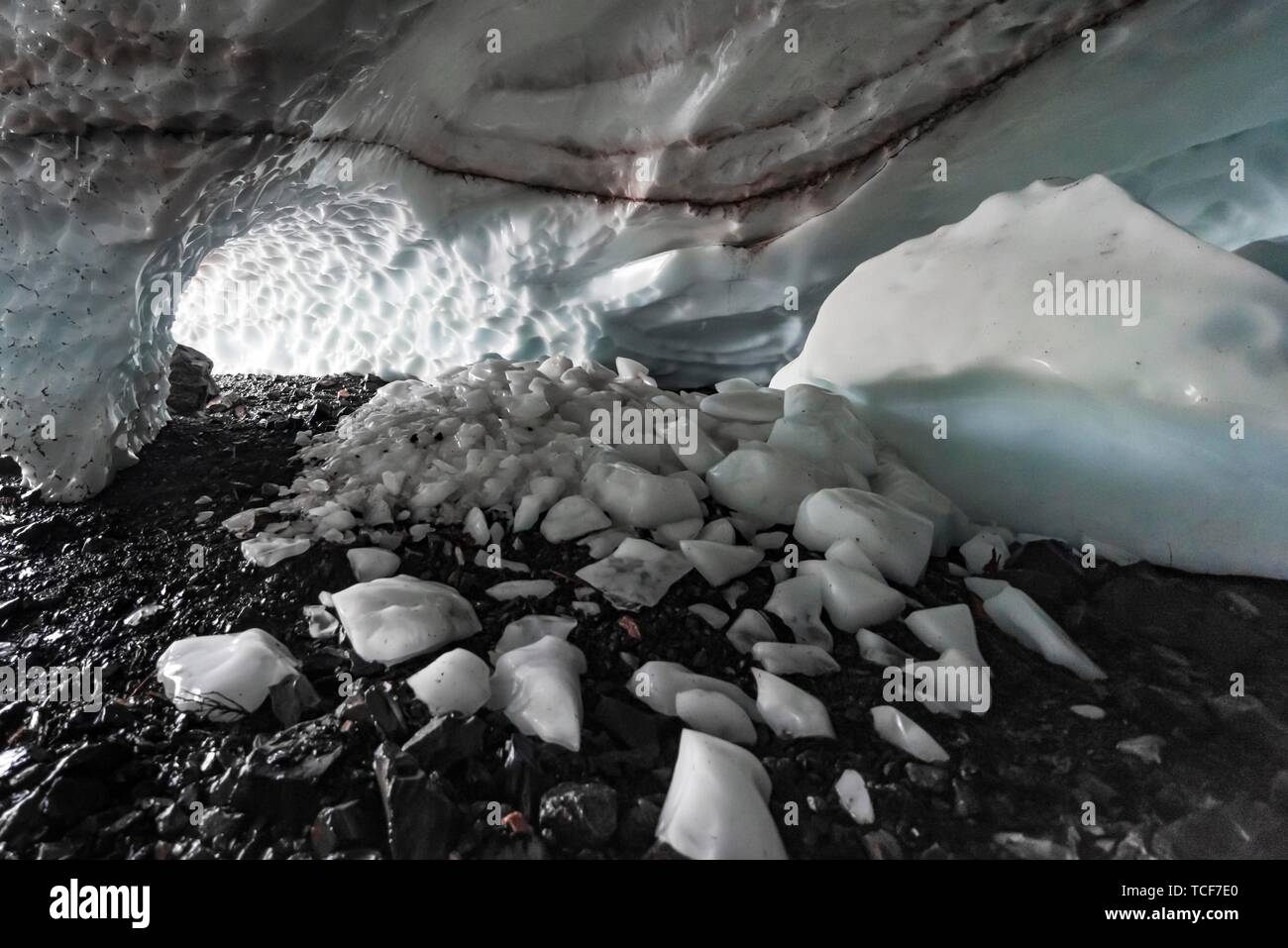 Entrance of an ice cave of a glacier, Big Four Ice Caves, Okanogan ...