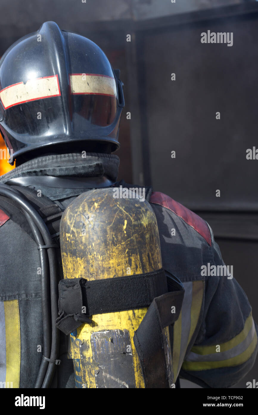 Firefighter putting out fire training station extinguisher backdraft ...