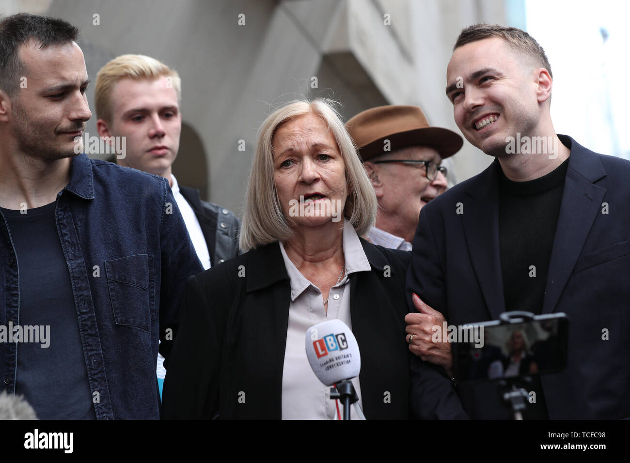 Sally Challen, flanked by her sons James (left) and David (right ...