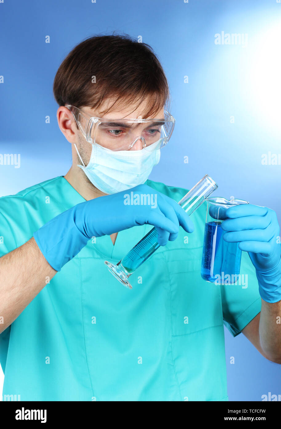 scientist in the lab working with chemicals test-tubes Stock Photo - Alamy
