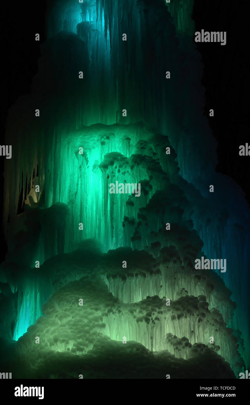 Huge ice icicles. Fragment of large blocks of ice frozen waterfall of ...