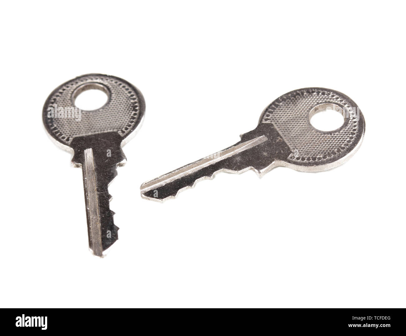 Two metal keys isolated on white Stock Photo - Alamy