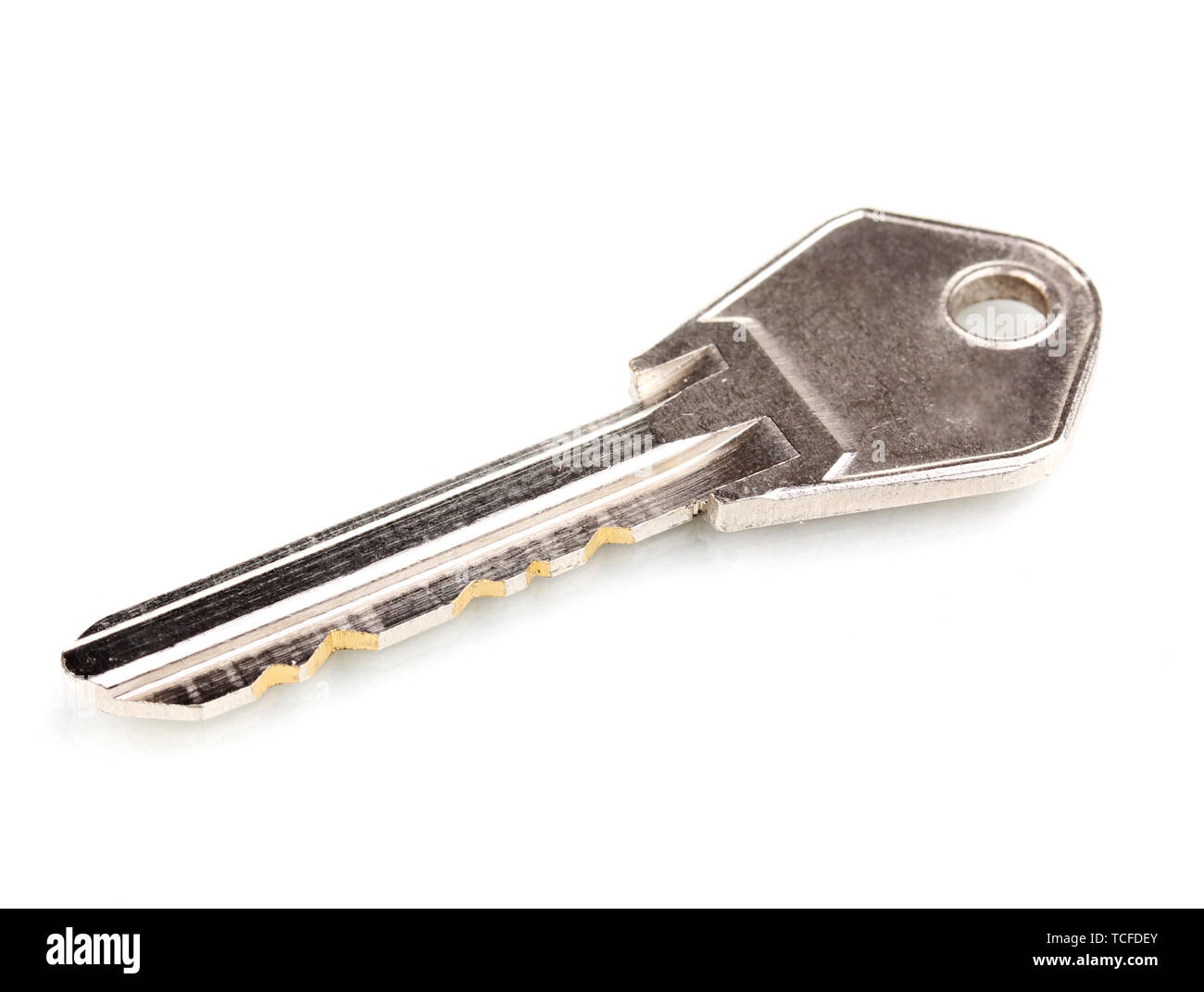 Metal key isolated on white Stock Photo - Alamy