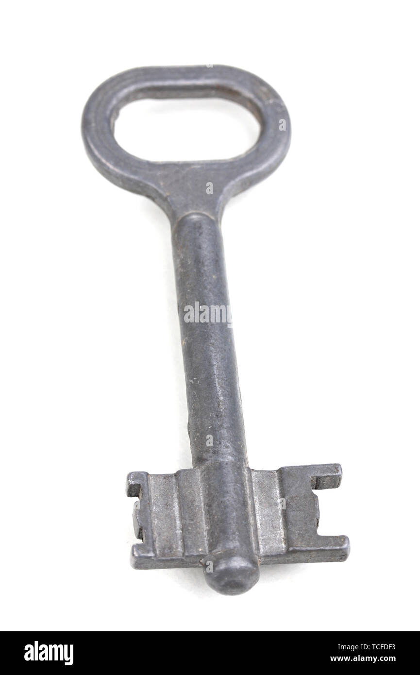 Metal key isolated on white Stock Photo - Alamy