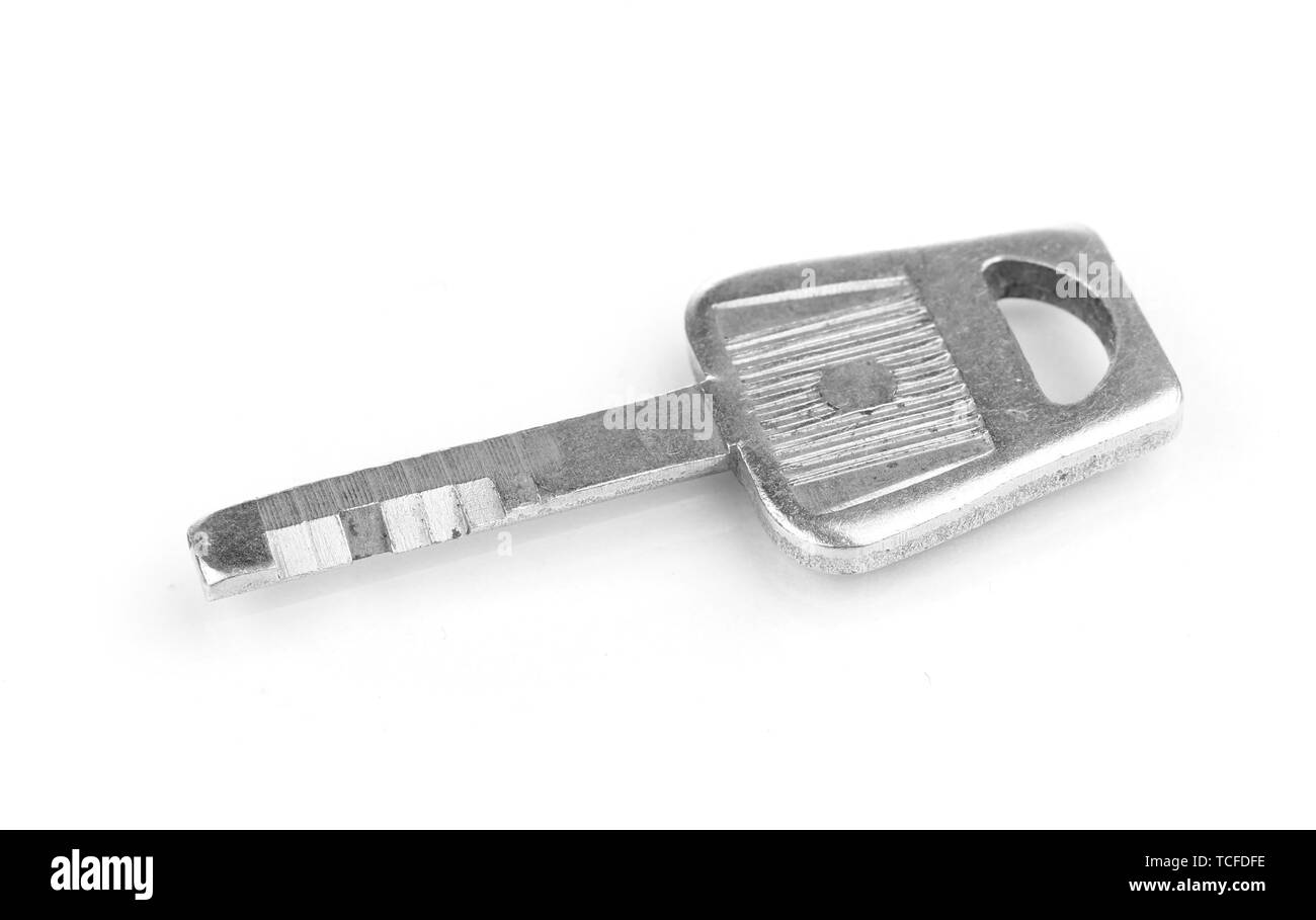 Metal key isolated on white Stock Photo - Alamy