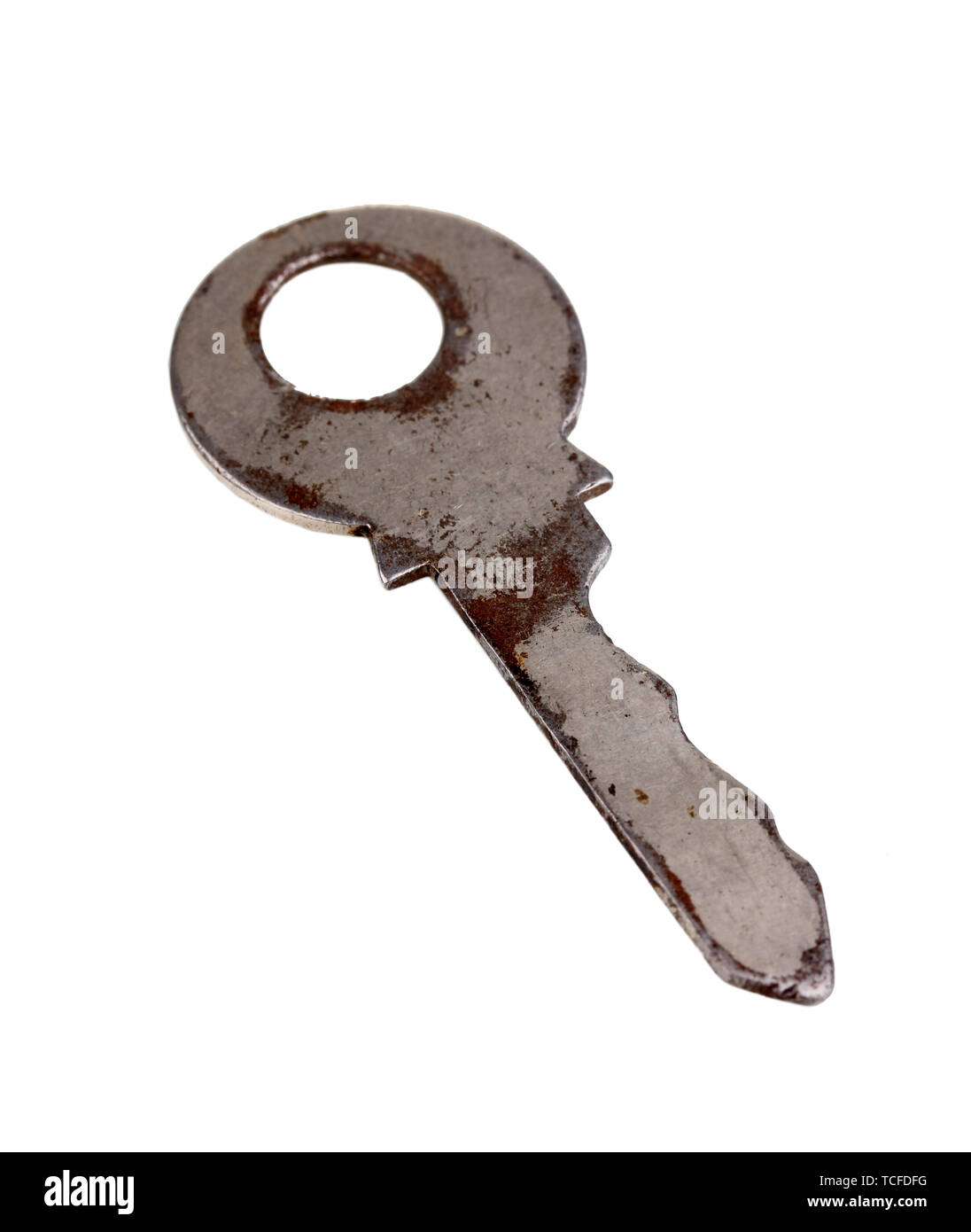 Metal key isolated on white Stock Photo - Alamy