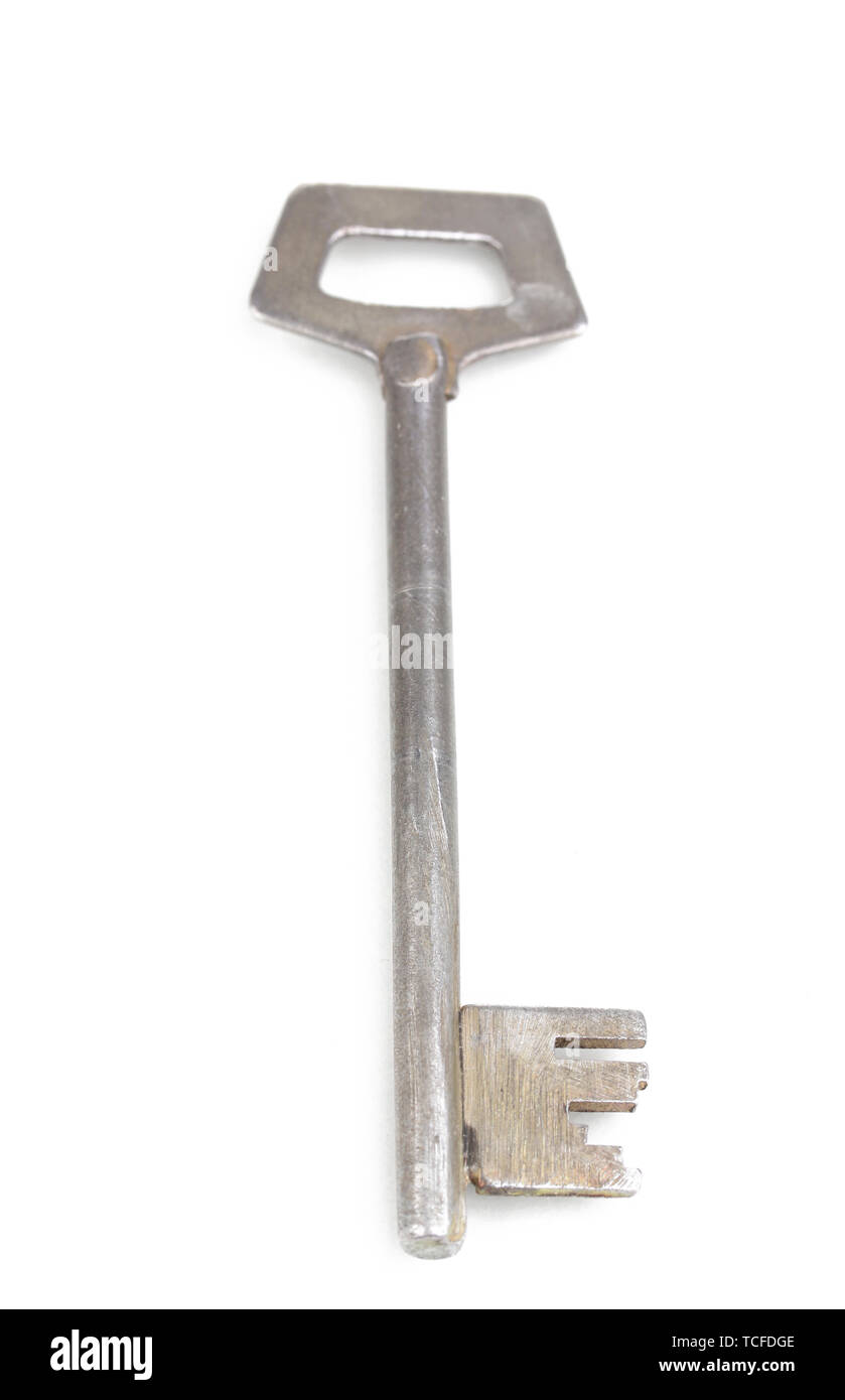 Metal key isolated on white Stock Photo - Alamy