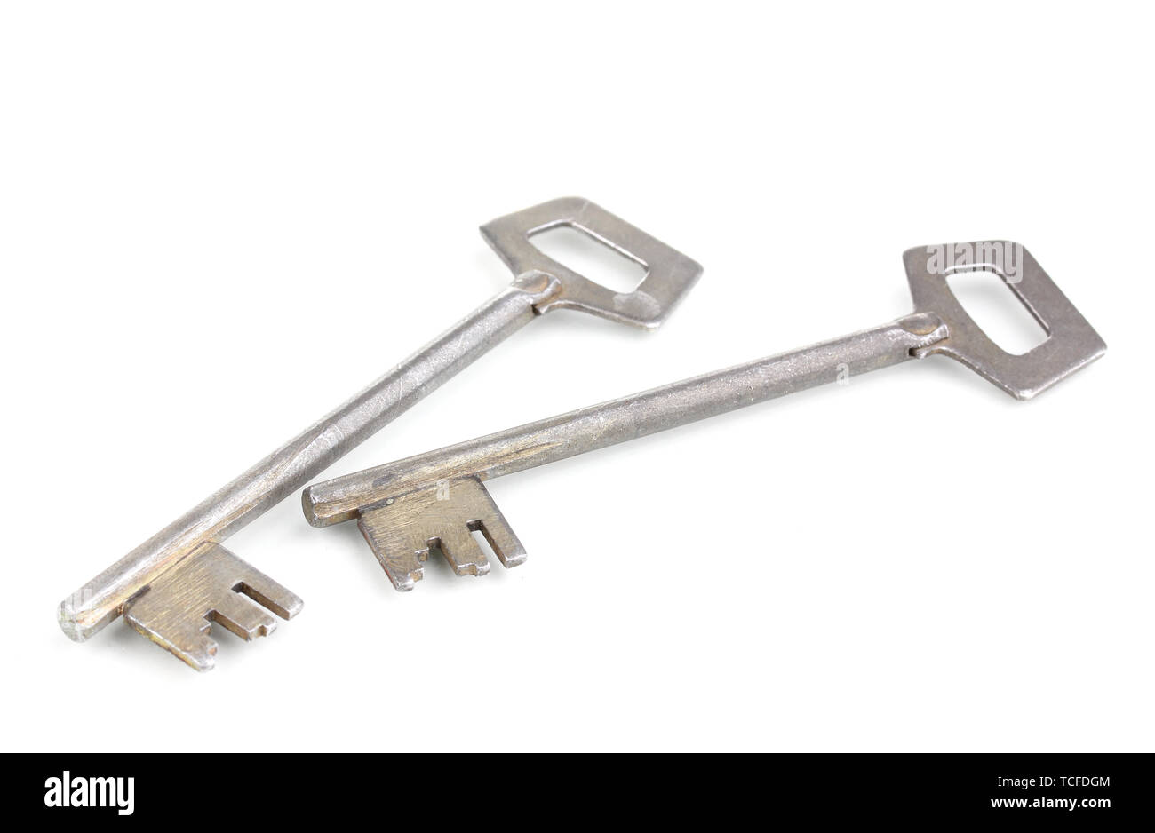 Two metal keys isolated on white Stock Photo - Alamy