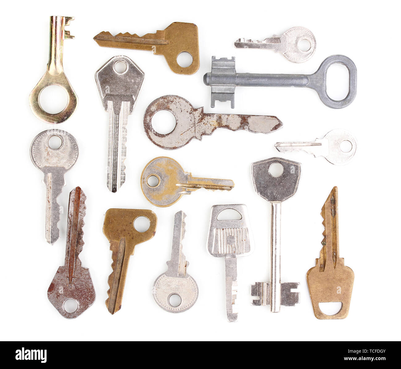 Many metal keys isolated on white Stock Photo - Alamy