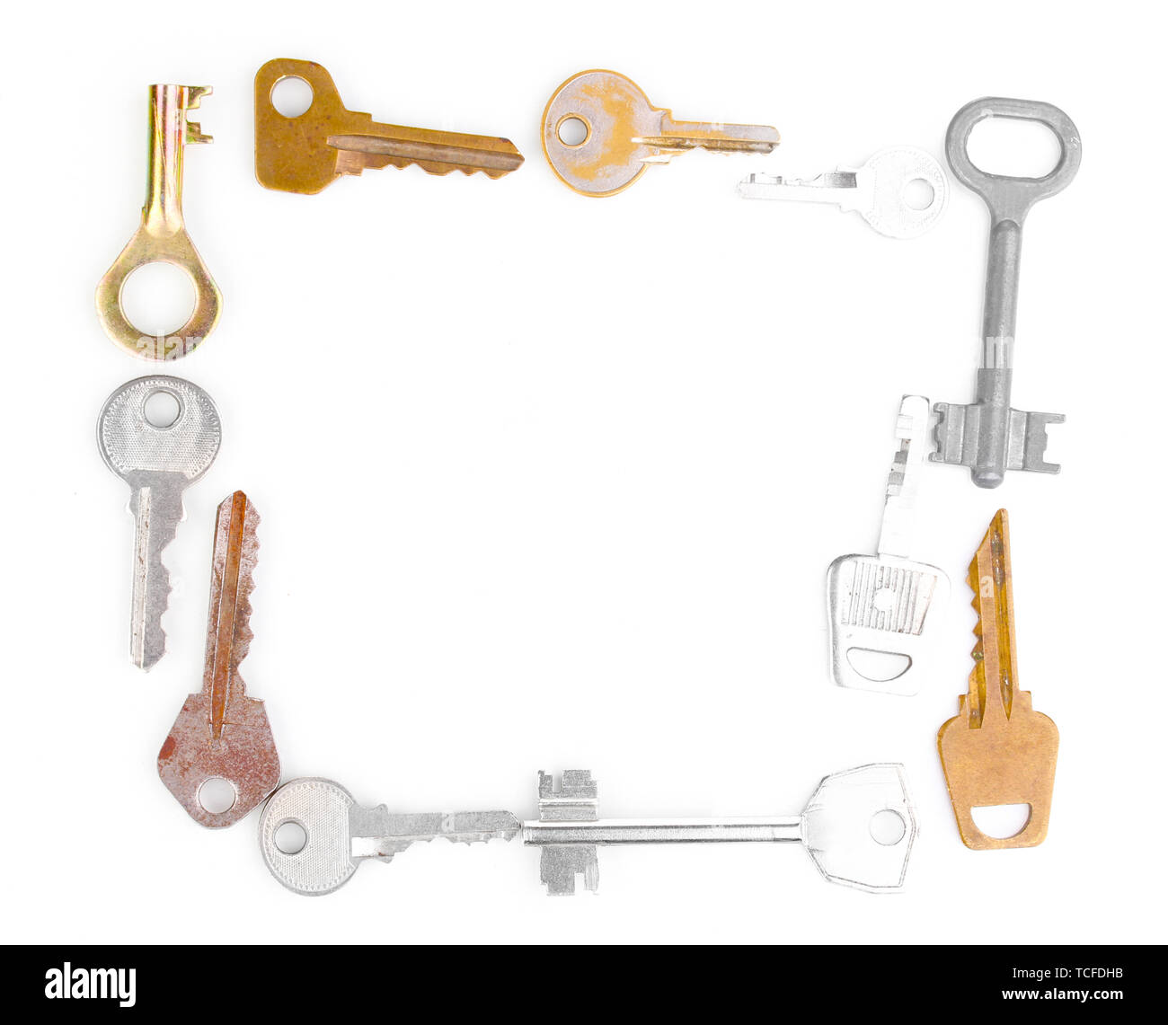 Many metal keys isolated on white Stock Photo - Alamy