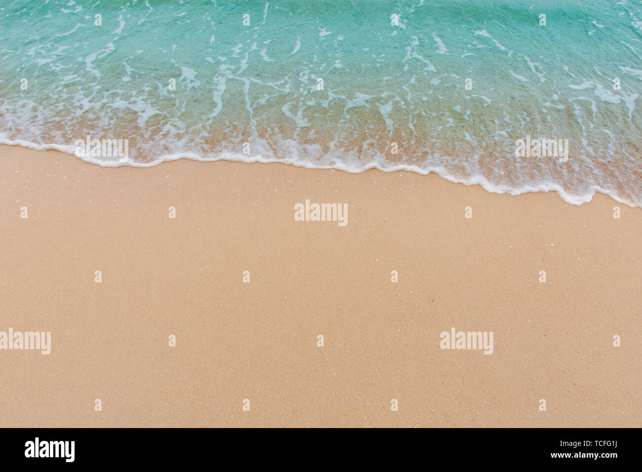 Soft wave of sea on empty sandy beach Background with copy space Stock ...