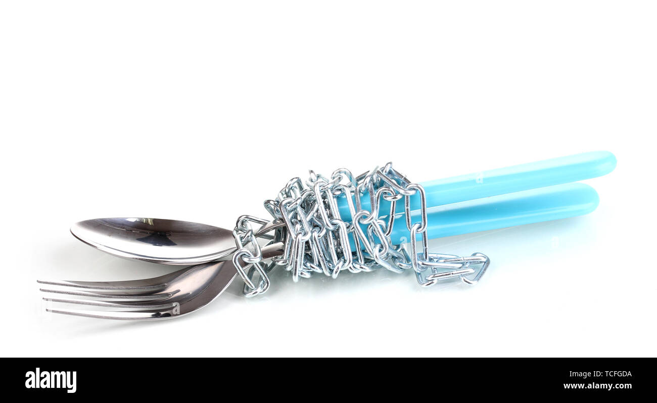 Fork and spoon with chain isolated on white Stock Photo - Alamy