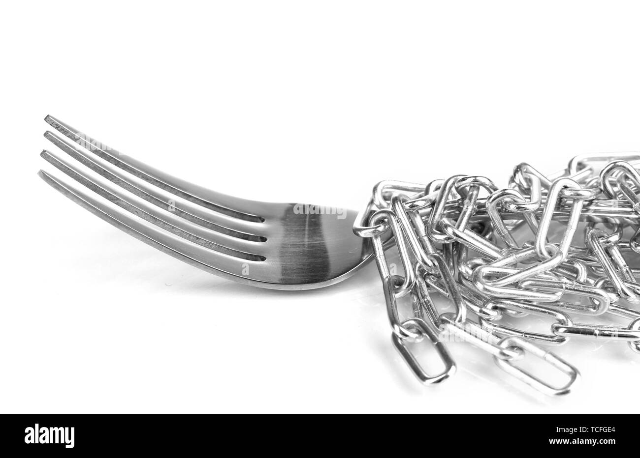 Fork with chain close-up isolated on white Stock Photo - Alamy